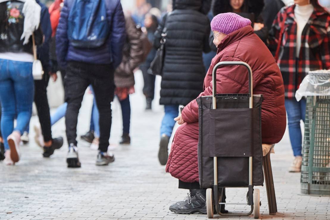 Homeless person begging on a busy shopping street | Allgemeine Fotos ...